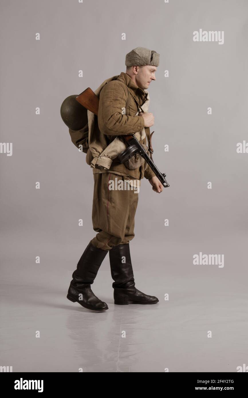 male actor in the winter military uniform of an officer of the Red Army ...