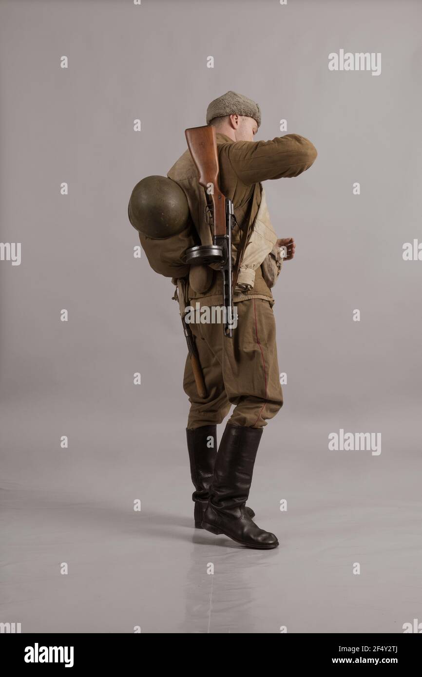male actor in the winter military uniform of an officer of the Red Army ...