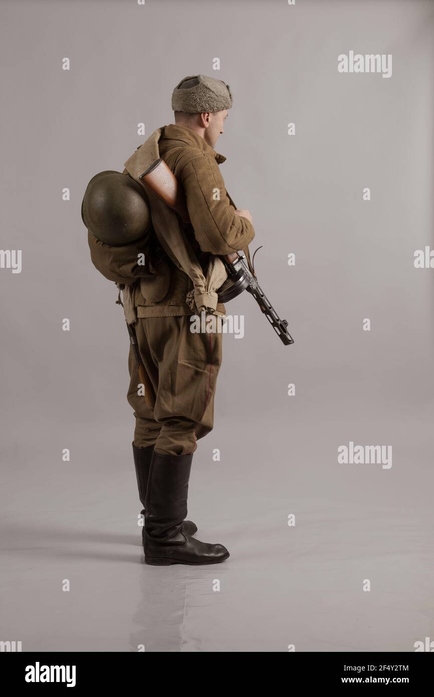 male actor in the winter military uniform of an officer of the Red Army ...