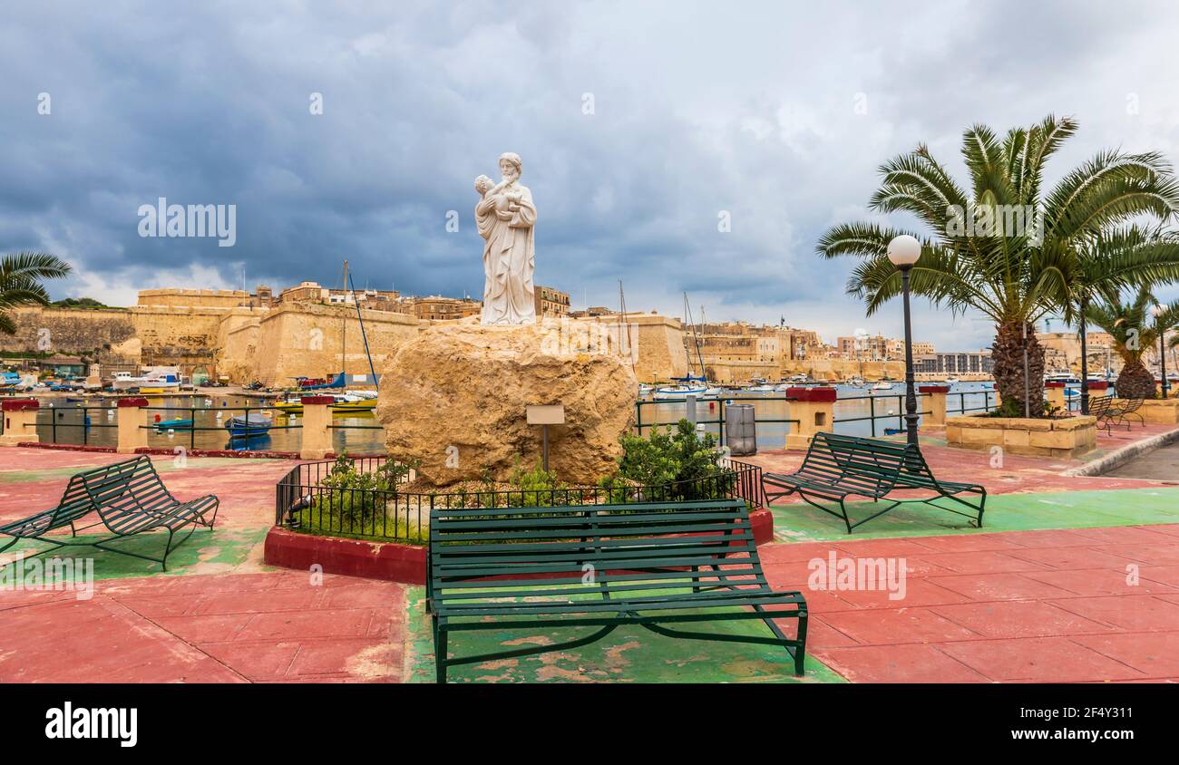 Statue of Saint Joseph in a small square in Senglea in front of the ...