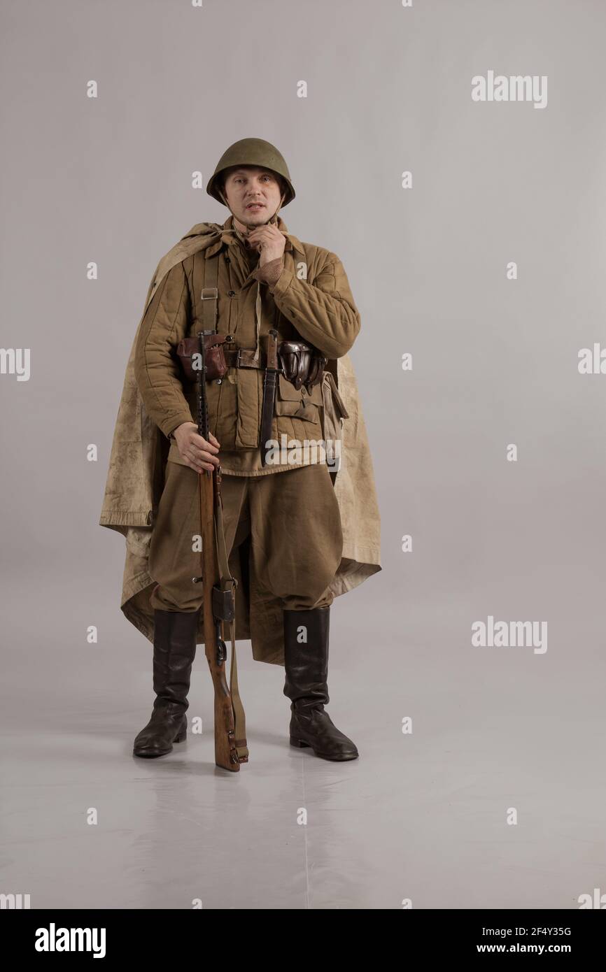 male actor in the military uniform of an officer of the Soviet Army ...