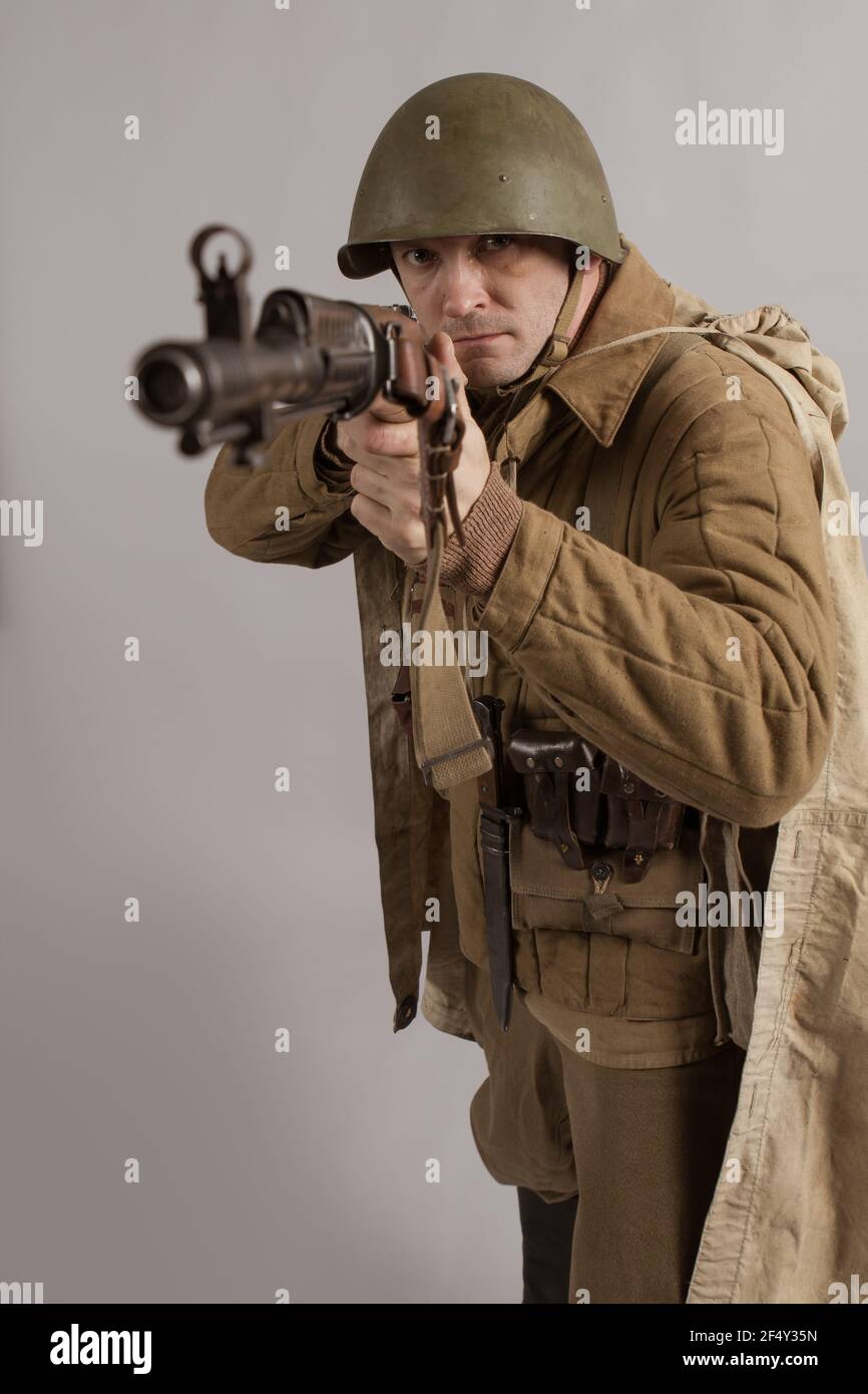 male actor in the military uniform of an officer of the Soviet Army ...
