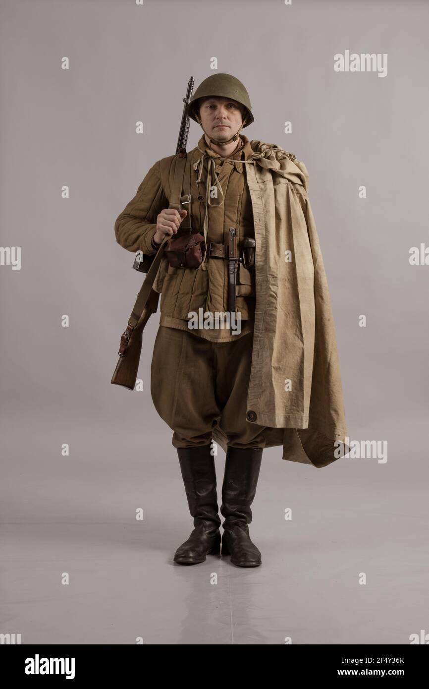 male actor in the military uniform of an officer of the Soviet Army ...