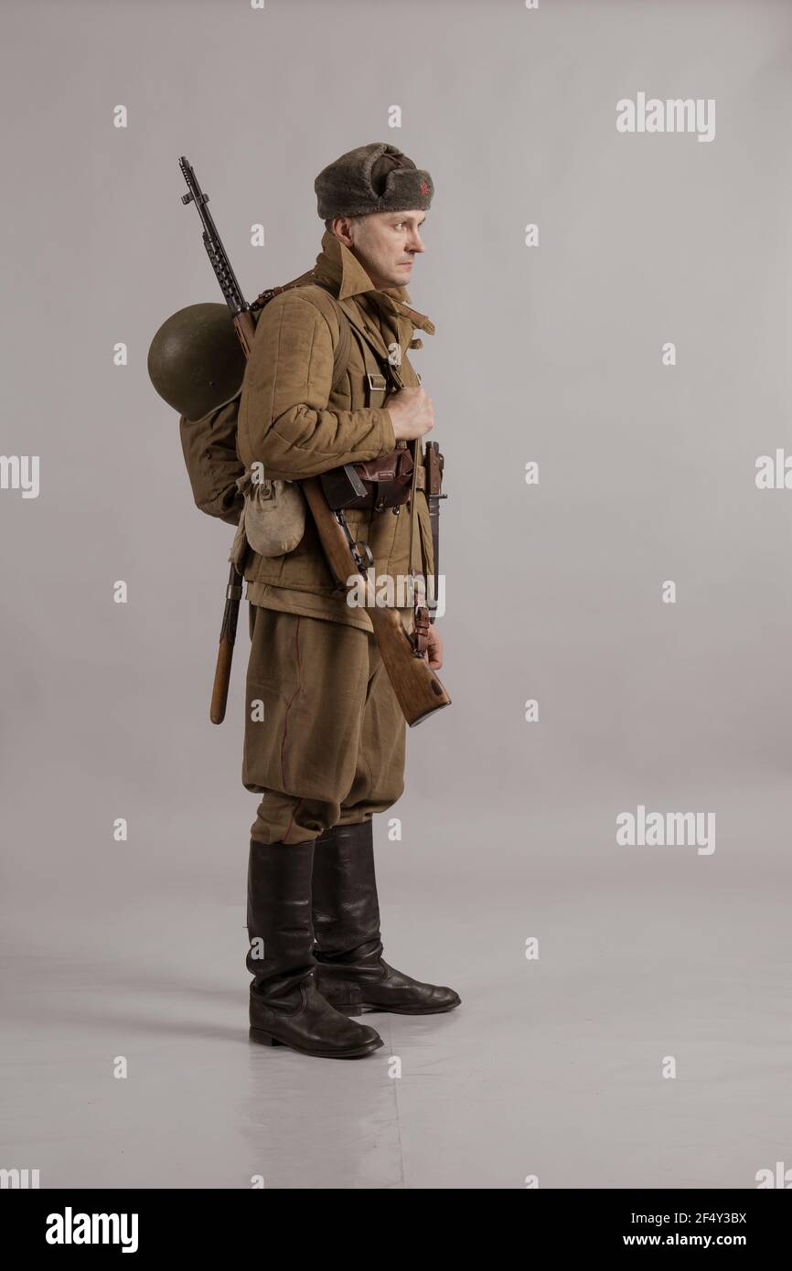 male actor in the military uniform of an officer of the Soviet Army ...