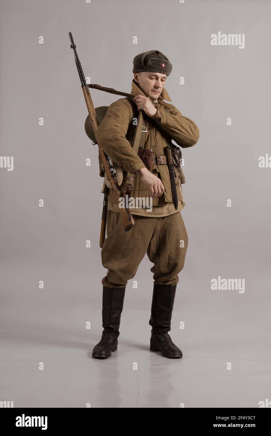 male actor in the military uniform of an officer of the Soviet Army ...