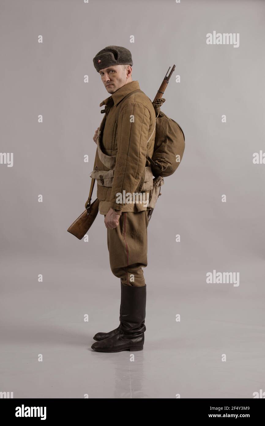male actor in the military uniform of an officer of the Soviet Army ...