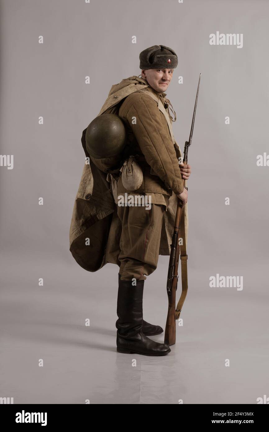 male actor in the military uniform of an officer of the Soviet Army ...