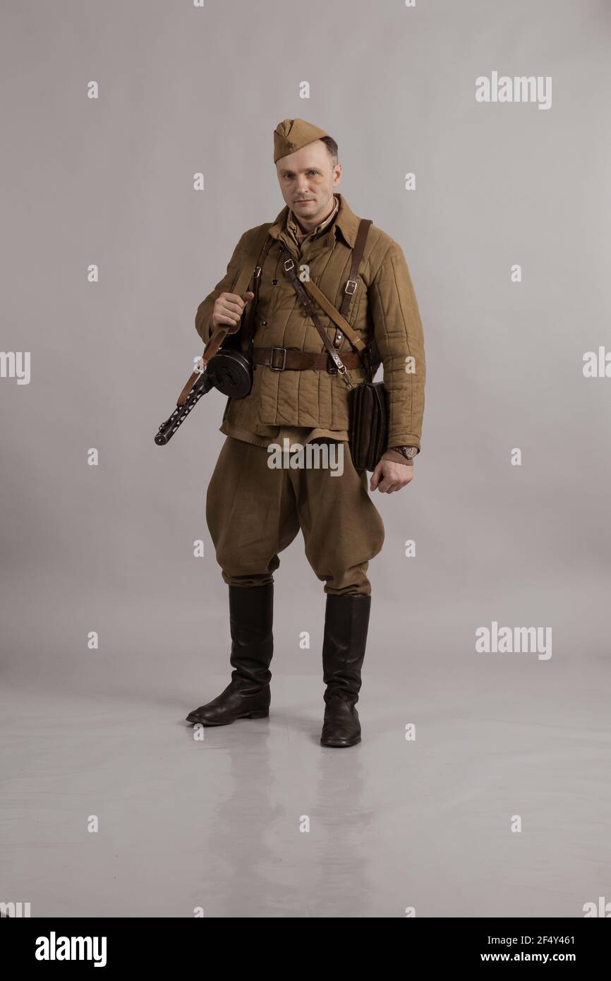 male actor in the military uniform of an officer of the Soviet Army ...
