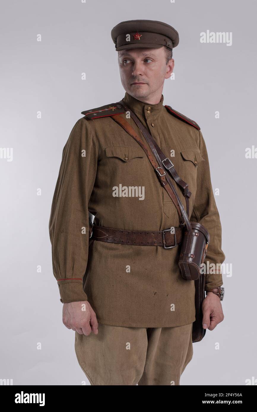 Male actor in the uniform of an officer of the Soviet Army during the ...
