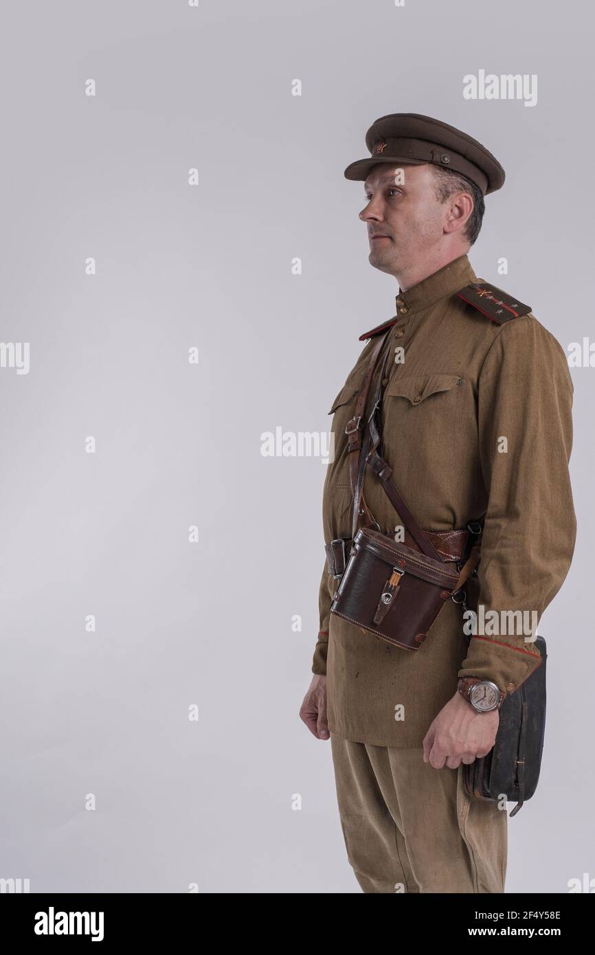 Male actor in the uniform of an officer of the Soviet Army during the ...