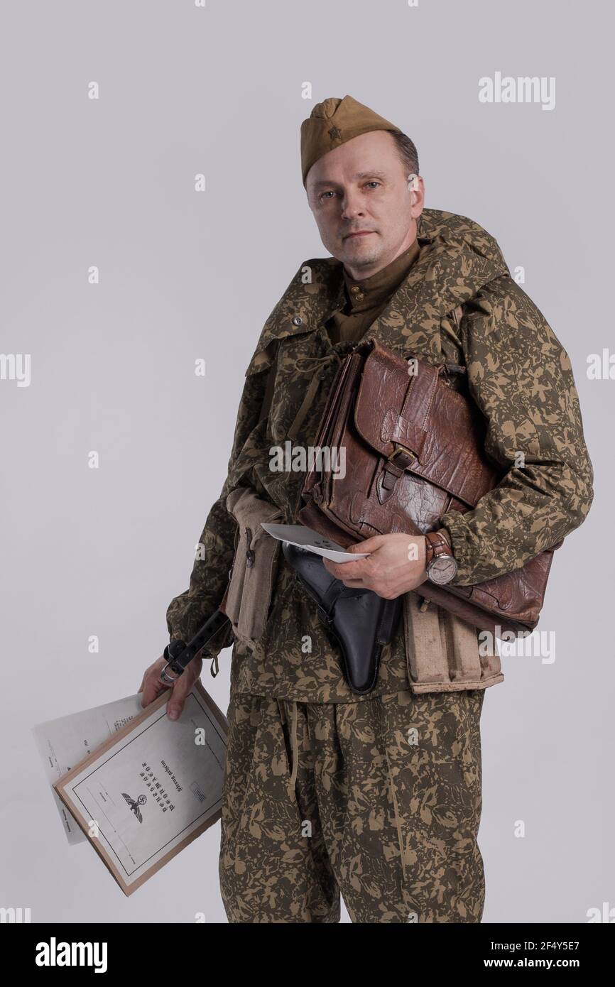 A male actor in the historical uniform of an officer of an army ...