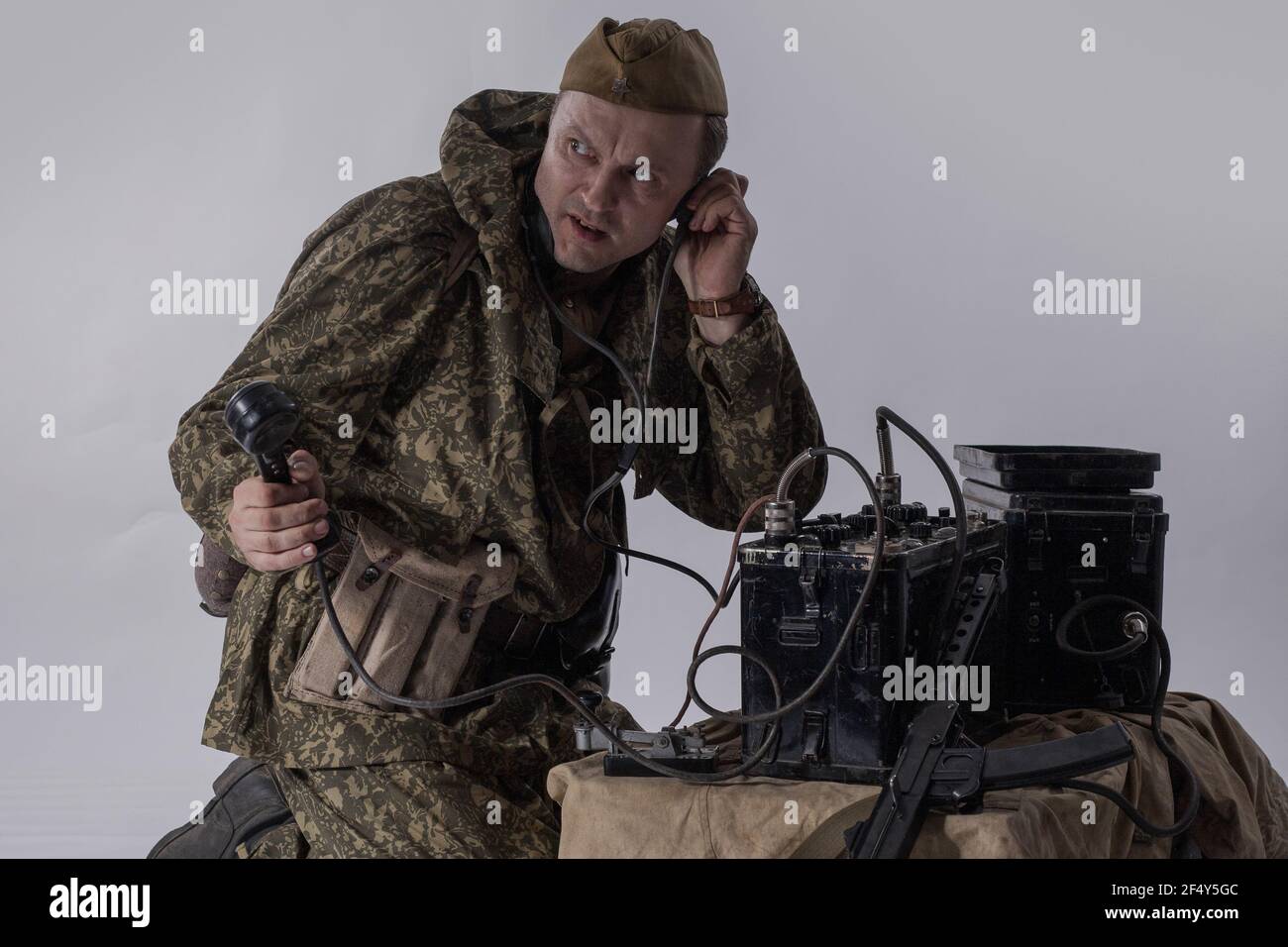 Male actor in the historical uniform of an officer of the Soviet Army ...