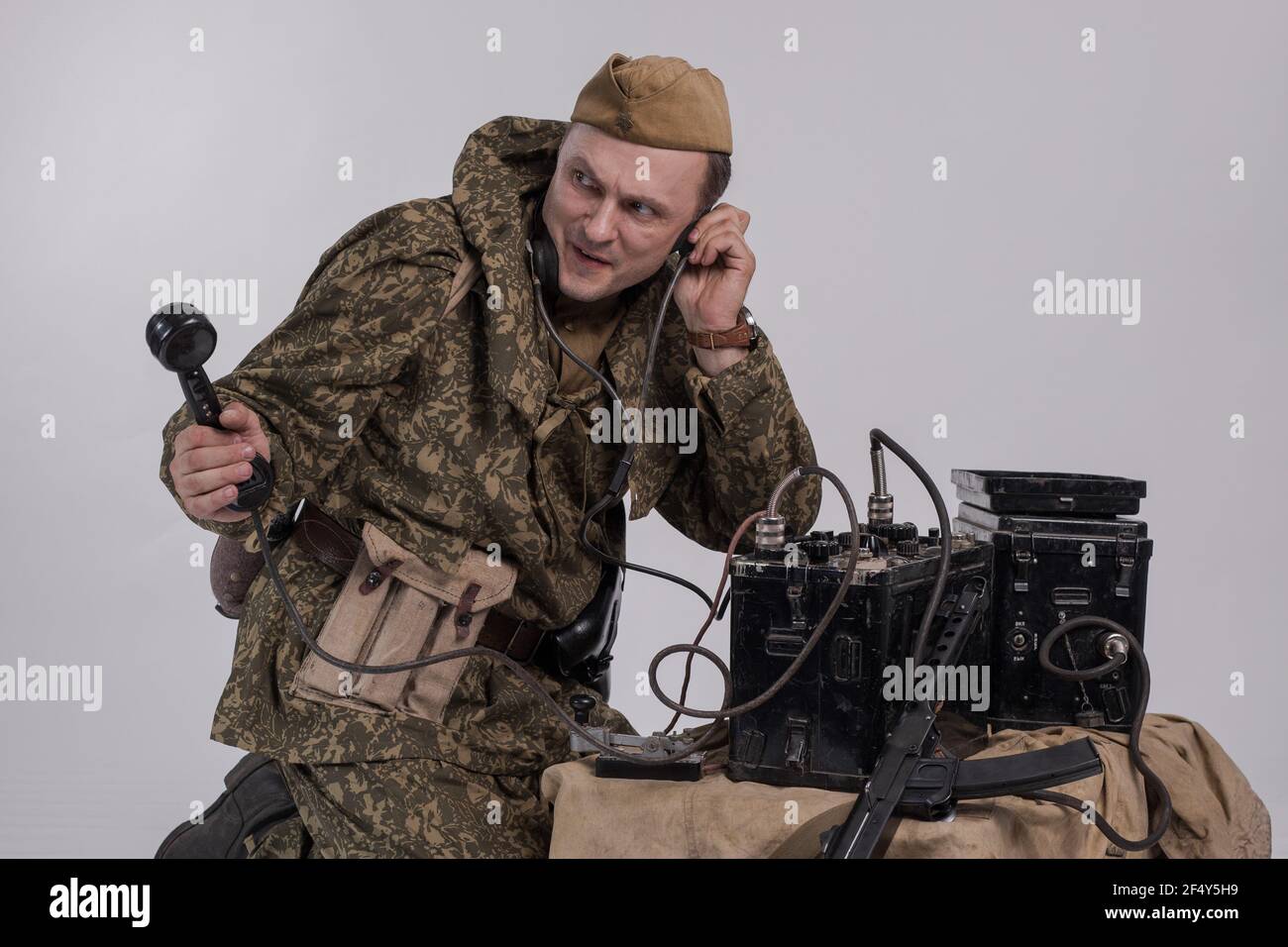 Male actor in the historical uniform of an officer of the Soviet Army ...
