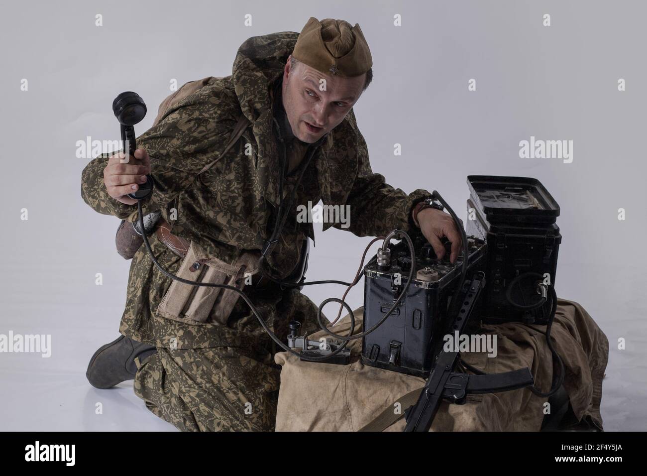 Male actor in the historical uniform of an officer of the Soviet Army ...
