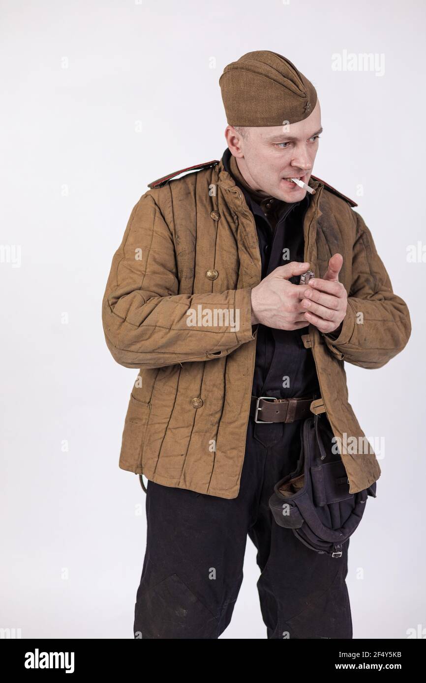 Portrait of a male actor in military uniform of an Russian tankman of ...