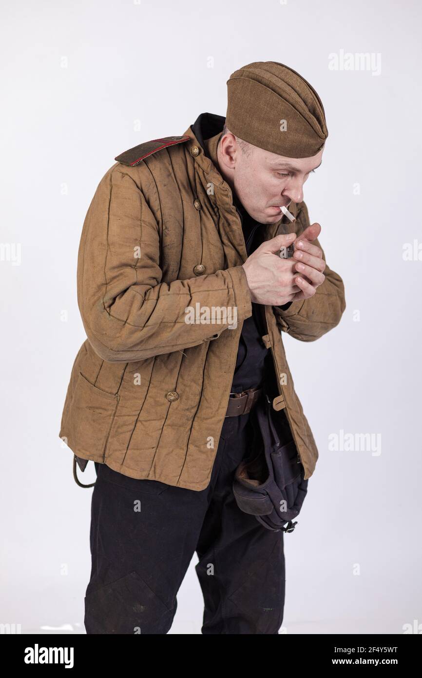 Portrait of a male actor in military uniform of an Russian tankman of ...