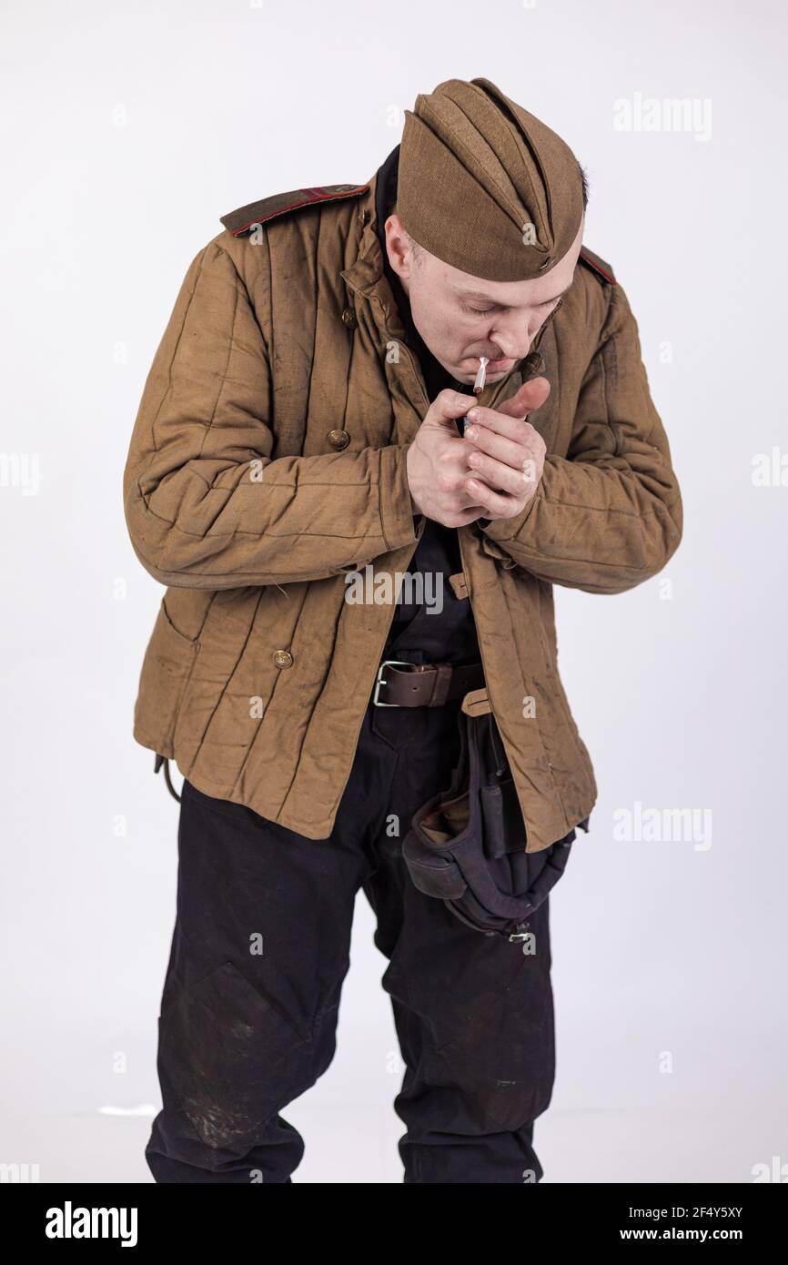 Portrait of a male actor in military uniform of an Russian tankman of ...