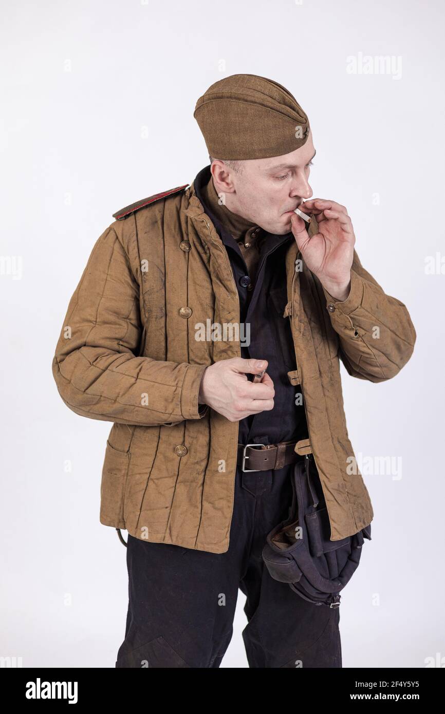 Portrait of a male actor in military uniform of an Russian tankman of ...