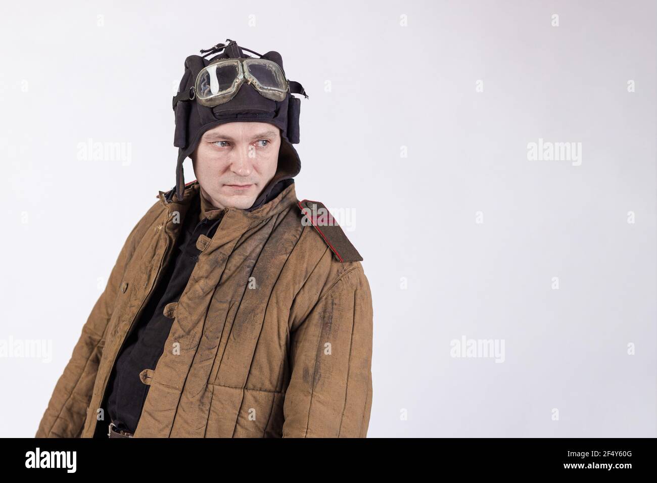 Male actor reenactor in historical military tank uniform during World ...