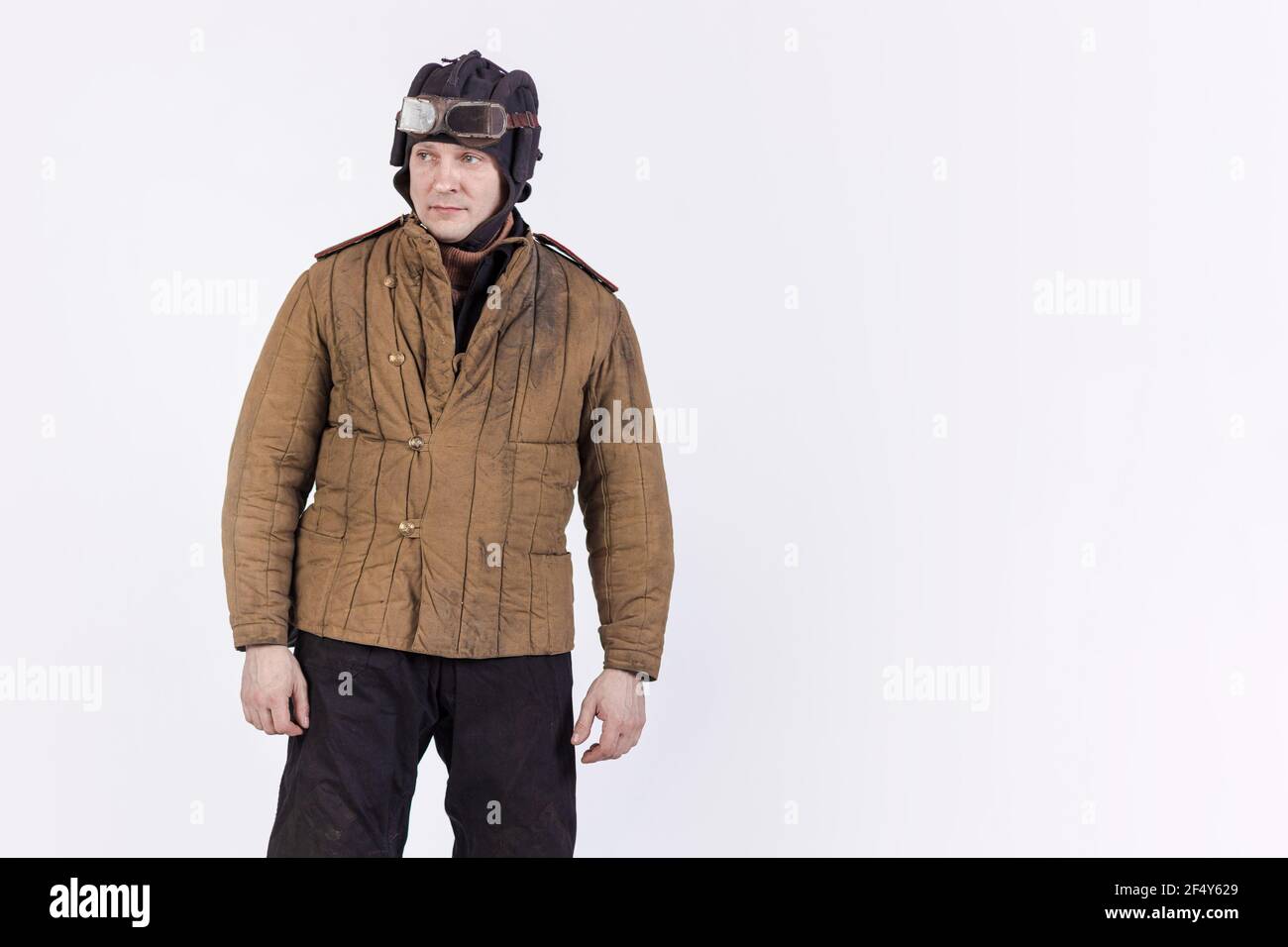 Male actor reenactor in historical military tank uniform during World ...