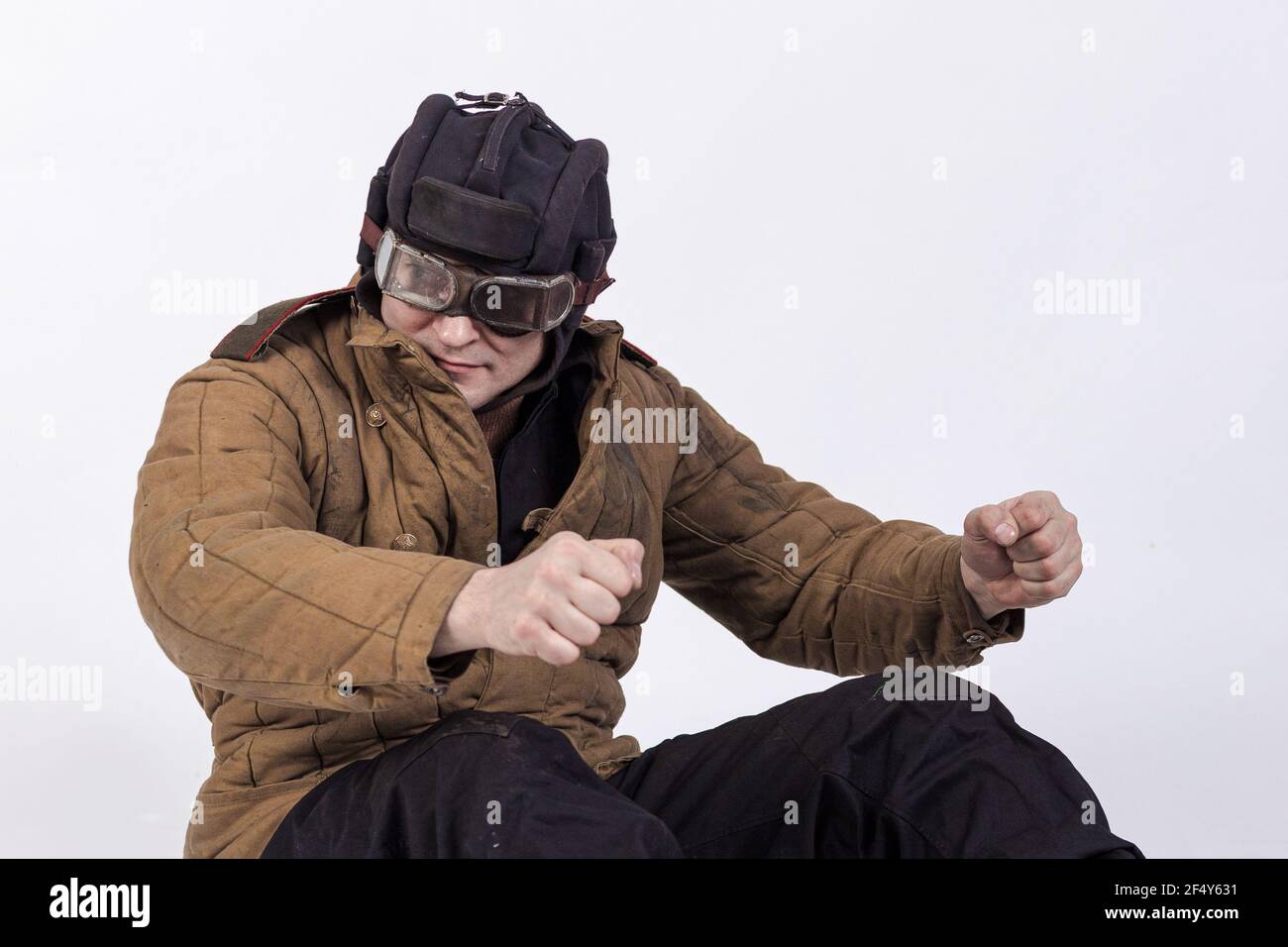 Male actor reenactor in historical military tank uniform during World ...