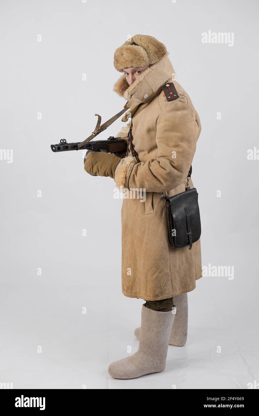 A man in a winter military uniform of an officer of the Soviet army ...