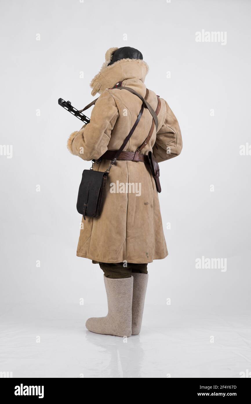 A man in a winter military uniform of an officer of the Soviet army ...
