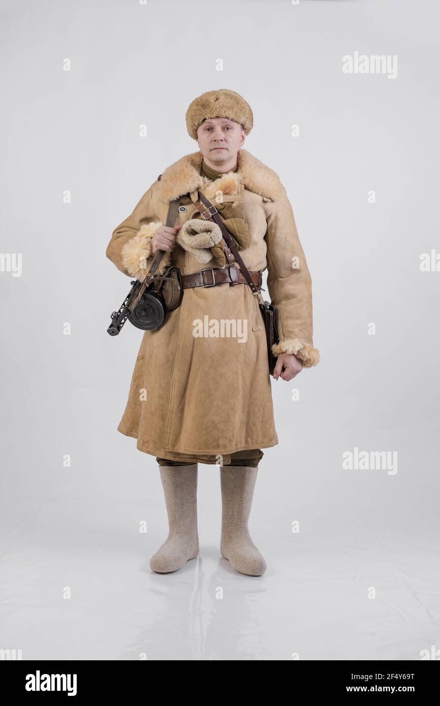 A man in a winter military uniform of an officer of the Soviet army ...