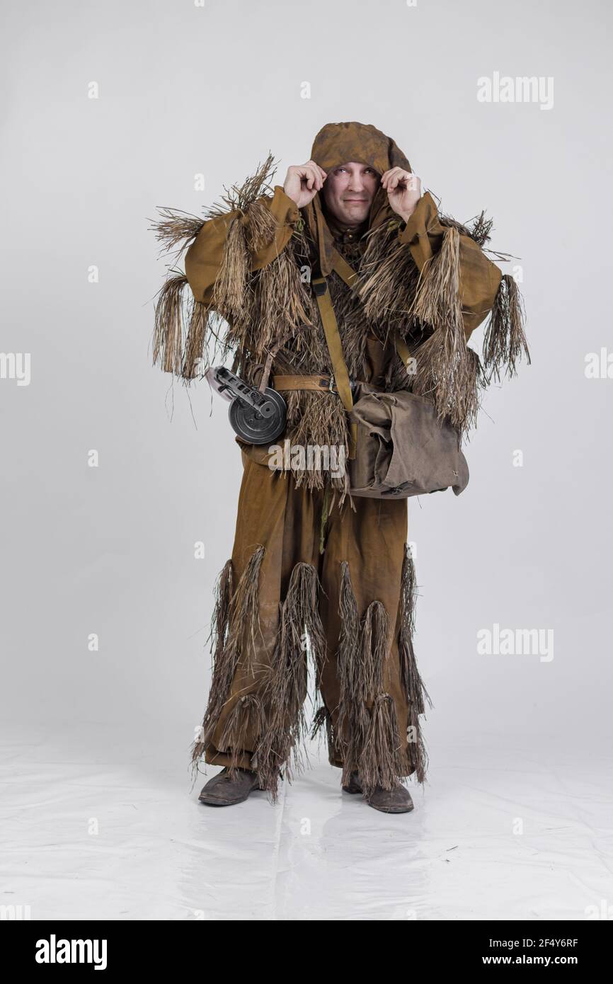 Man soldier radio operator of the Soviet army in old military uniform ...