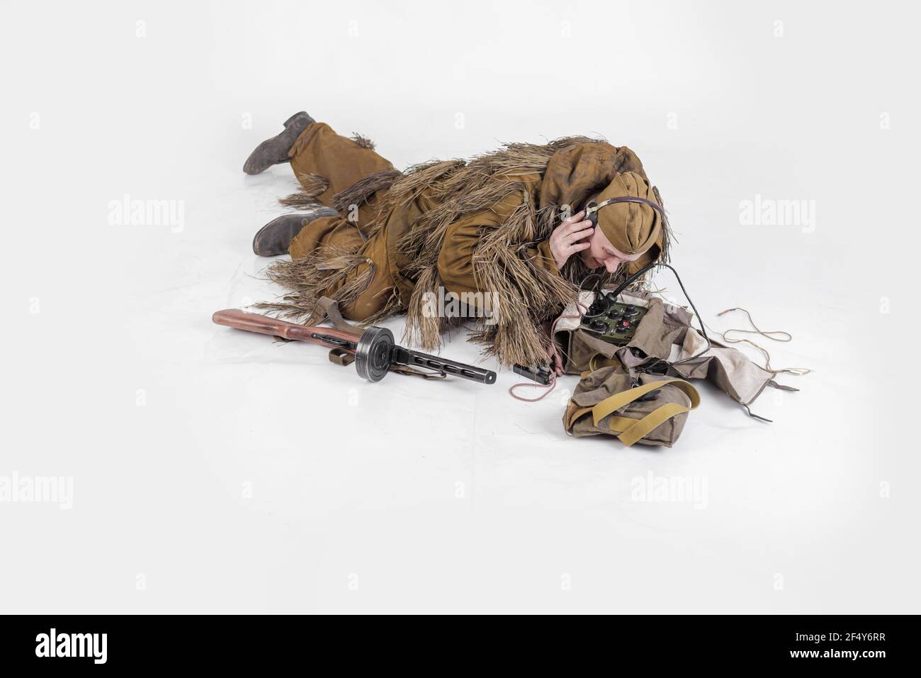 Man soldier radio operator of the Soviet army in old military uniform ...