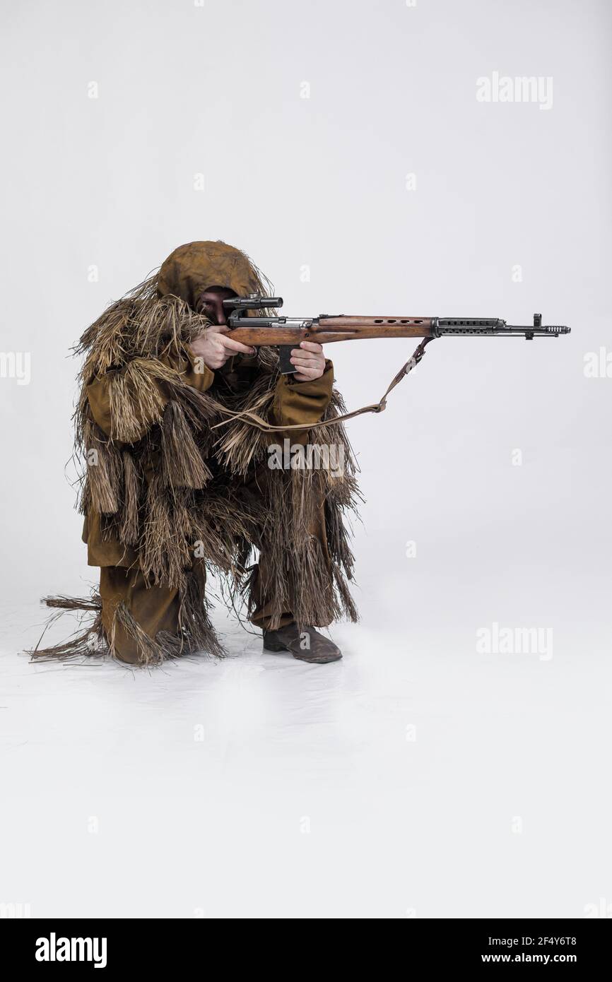 Man soldier radio operator of the Soviet army in old military uniform ...