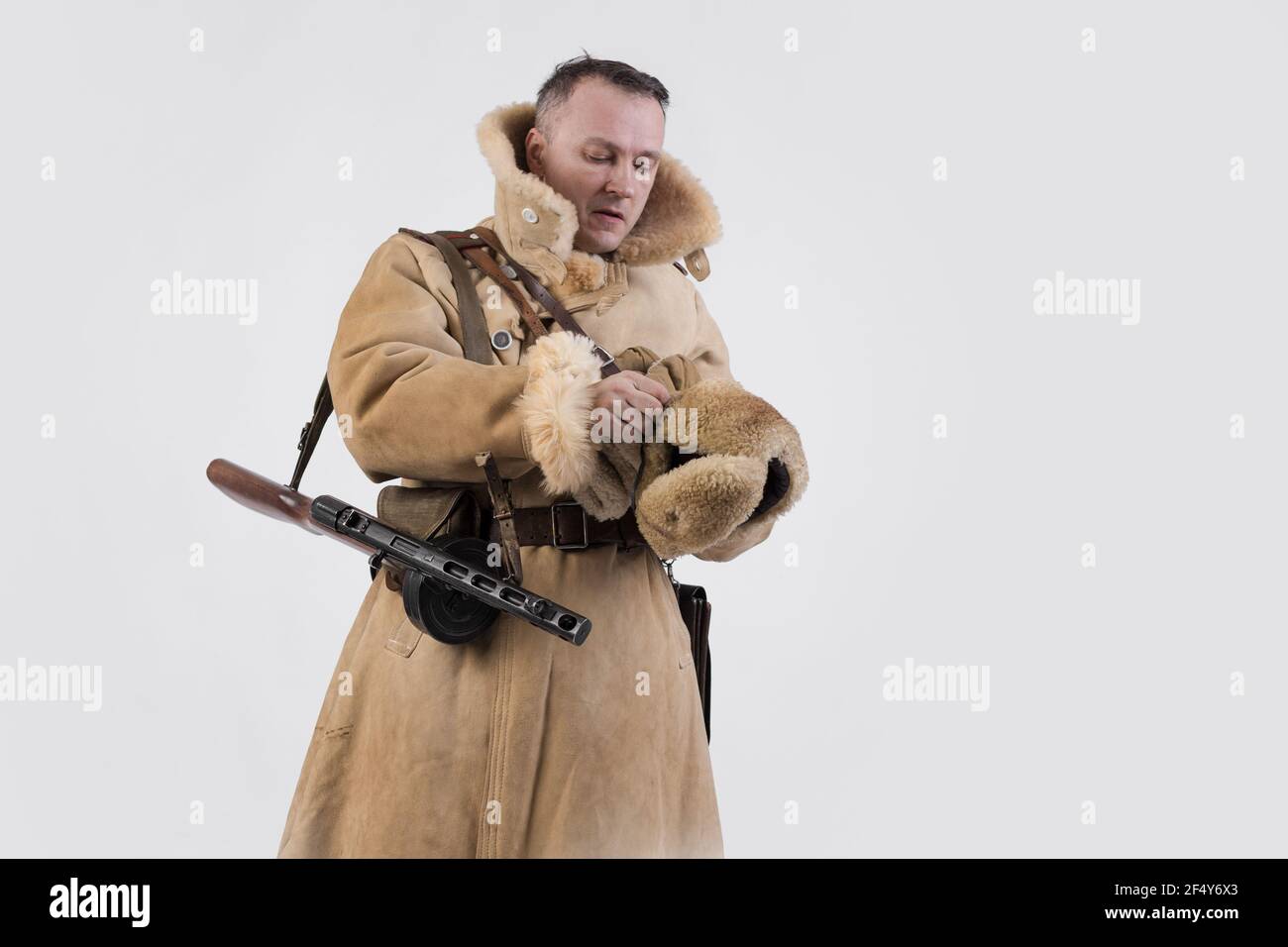 A man in a winter military uniform of an officer of the Soviet army ...