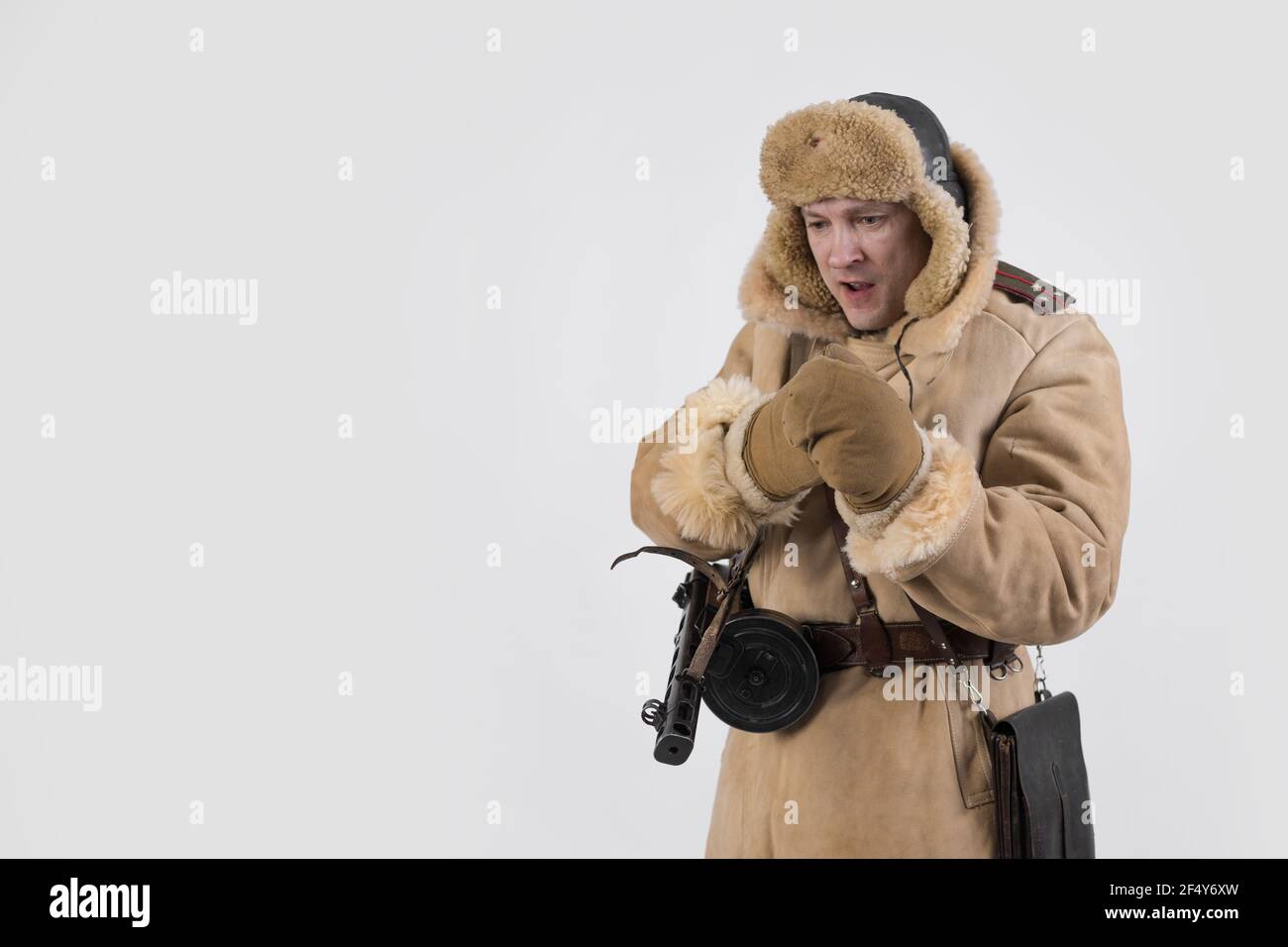 A man in a winter military uniform of an officer of the Soviet army ...