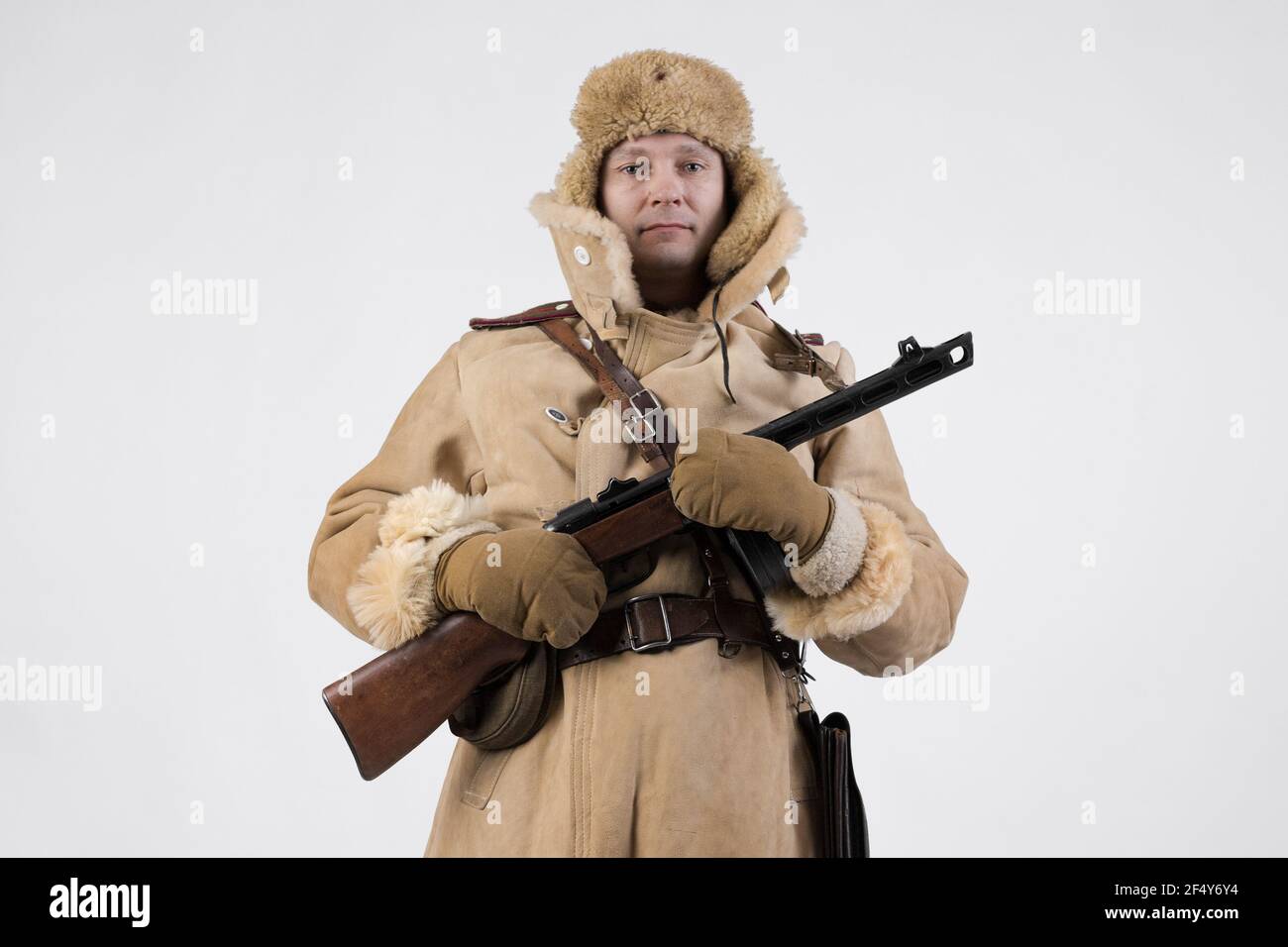 A man in a winter military uniform of an officer of the Soviet army ...