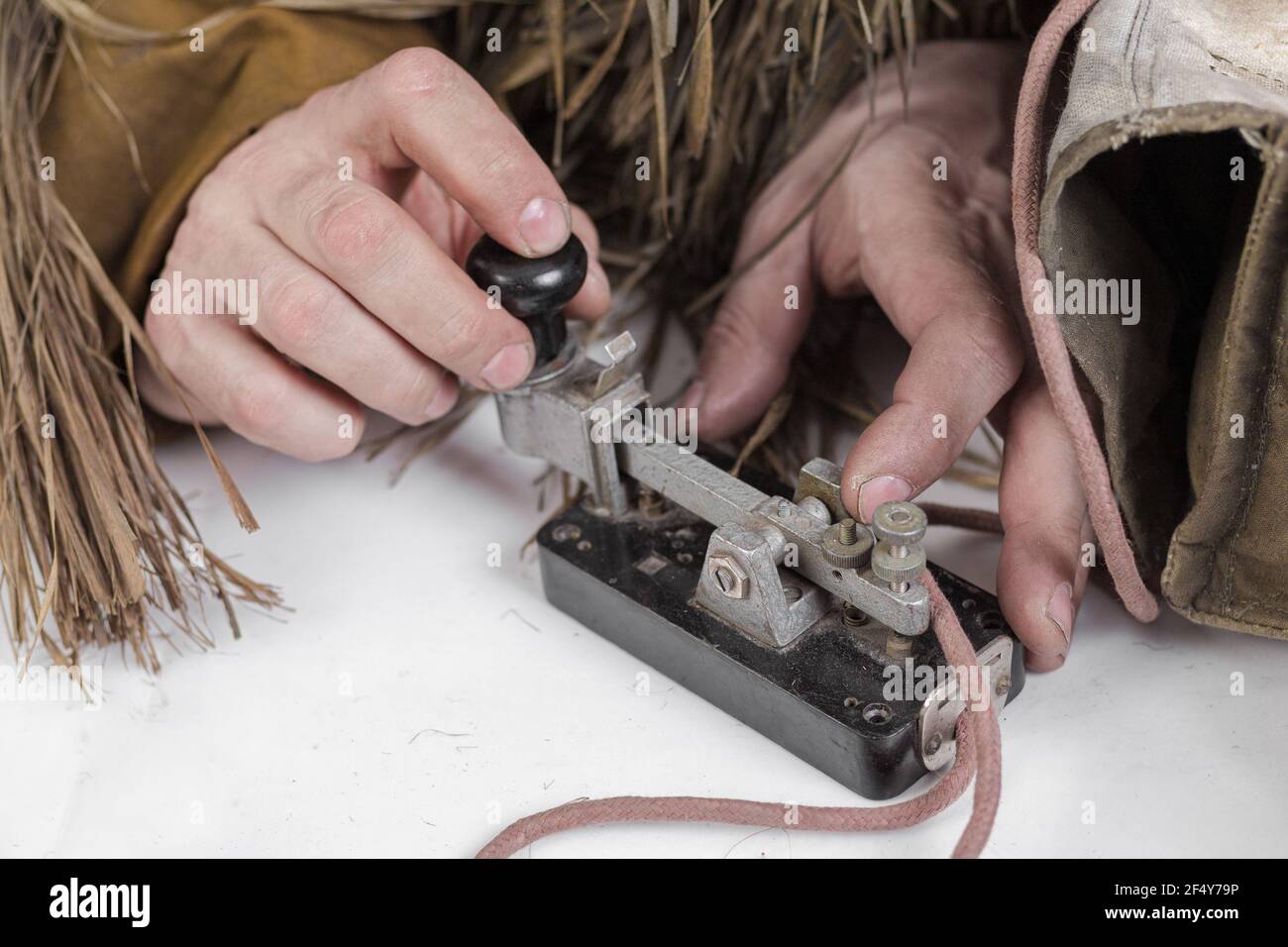 Man soldier radio operator of the Soviet army in old military uniform ...
