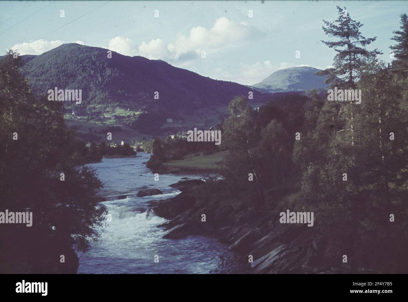 Travel photos. Flow landscape with mountain range Stock Photo - Alamy