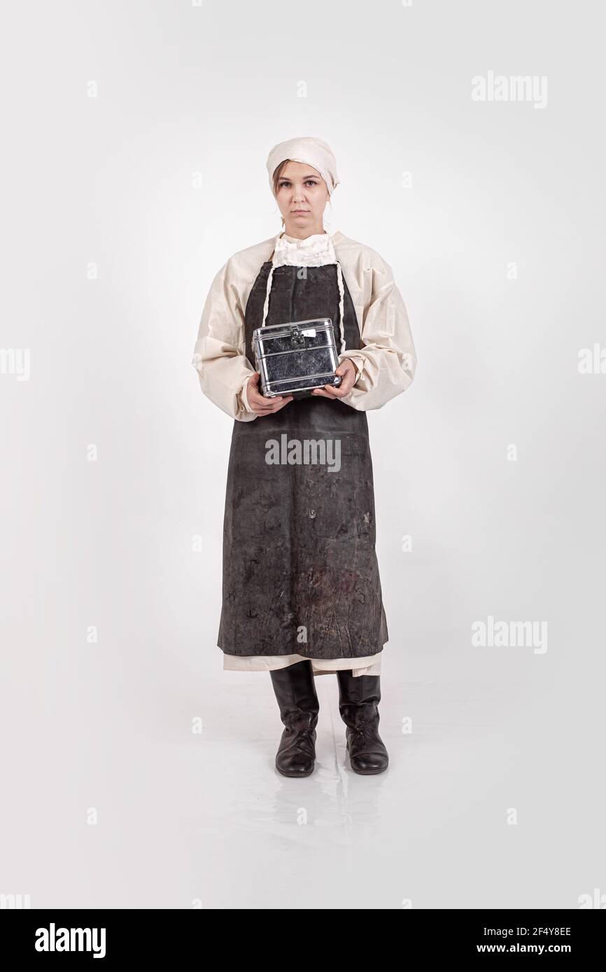 Young woman in white medical clothes, doctor or nurse of the Soviet ...