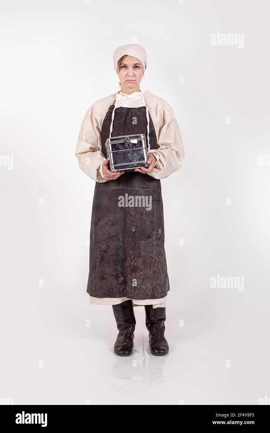 Young woman in white medical clothes, doctor or nurse of the Soviet ...