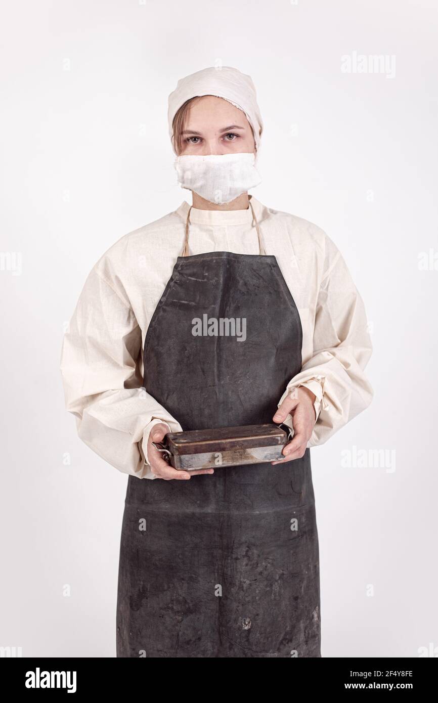 Young woman in white medical clothes, doctor or nurse of the Soviet ...