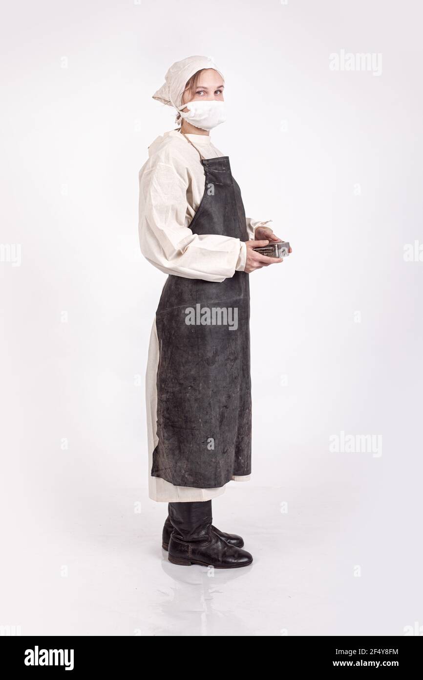 Young woman in white medical clothes, doctor or nurse of the Soviet ...