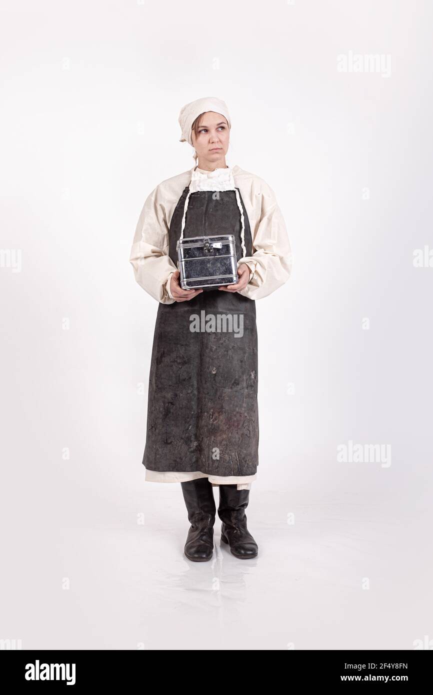 Young woman in white medical clothes, doctor or nurse of the Soviet ...