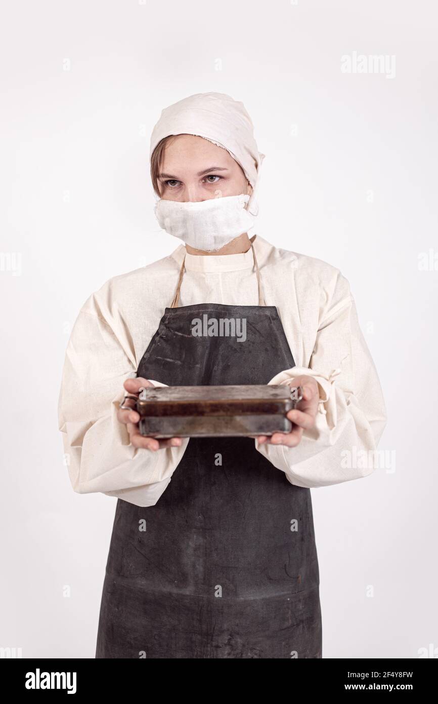 Young woman in white medical clothes, doctor or nurse of the Soviet ...