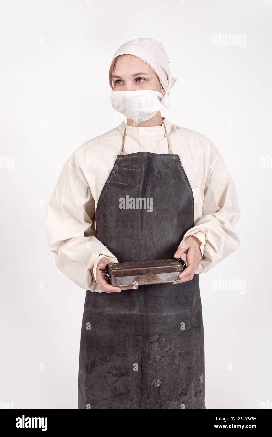 Young woman in white medical clothes, doctor or nurse of the Soviet ...