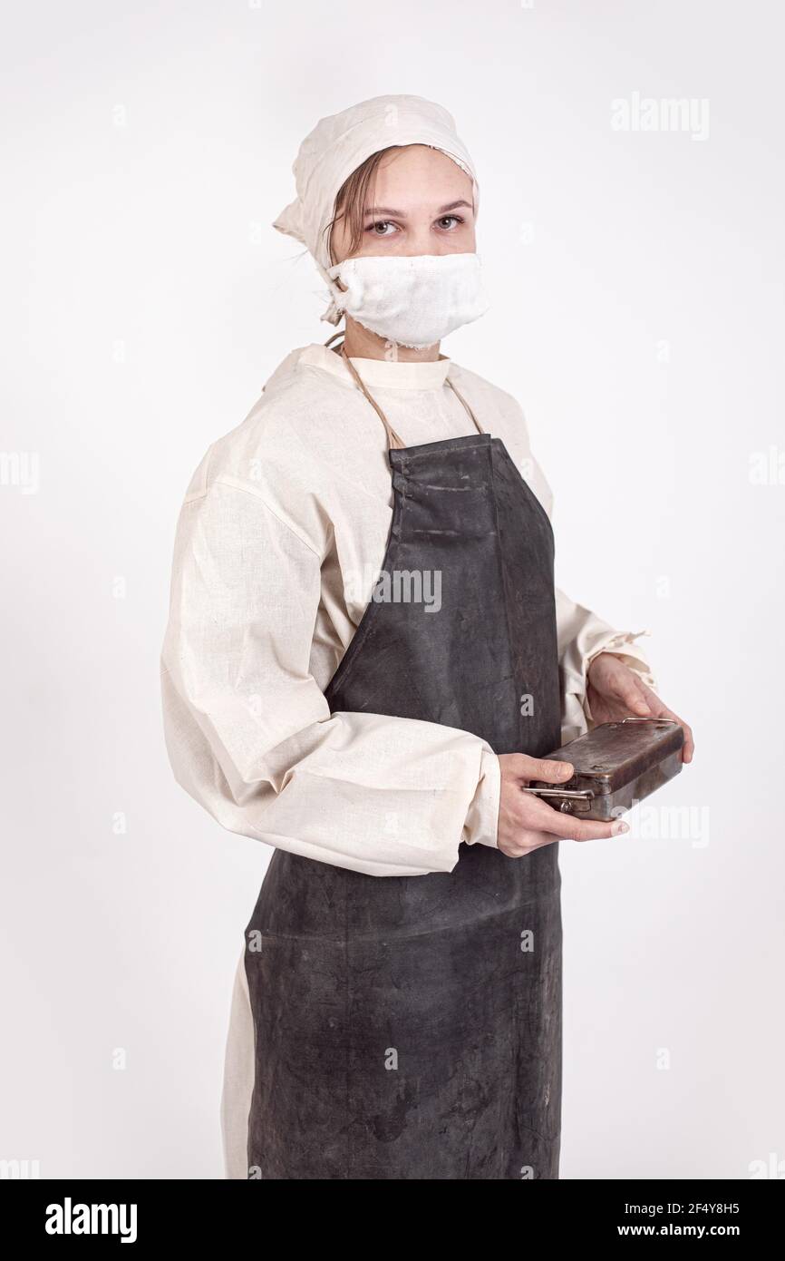 Young woman in white medical clothes, doctor or nurse of the Soviet ...