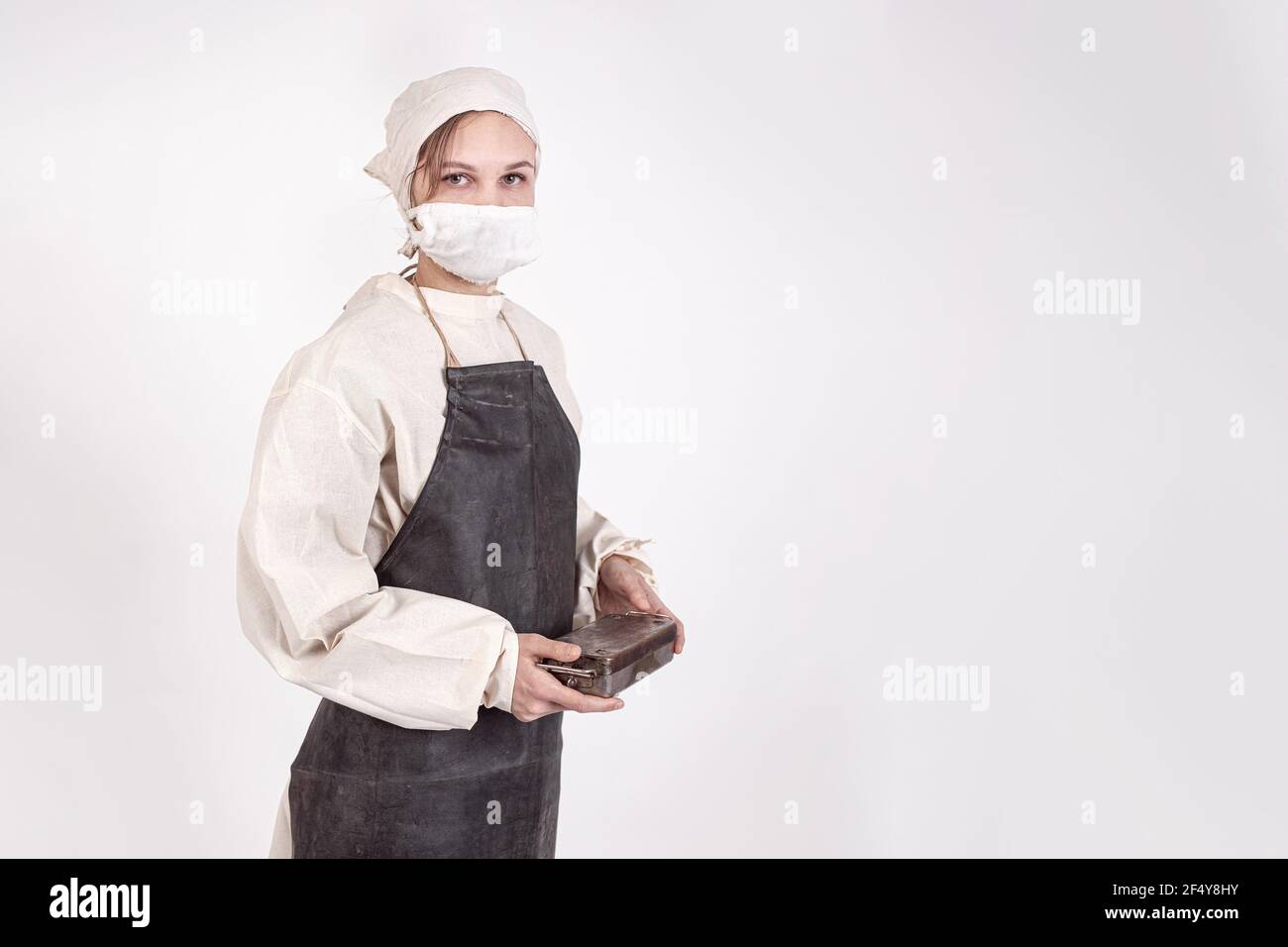 Young woman in white medical clothes, doctor or nurse of the Soviet ...