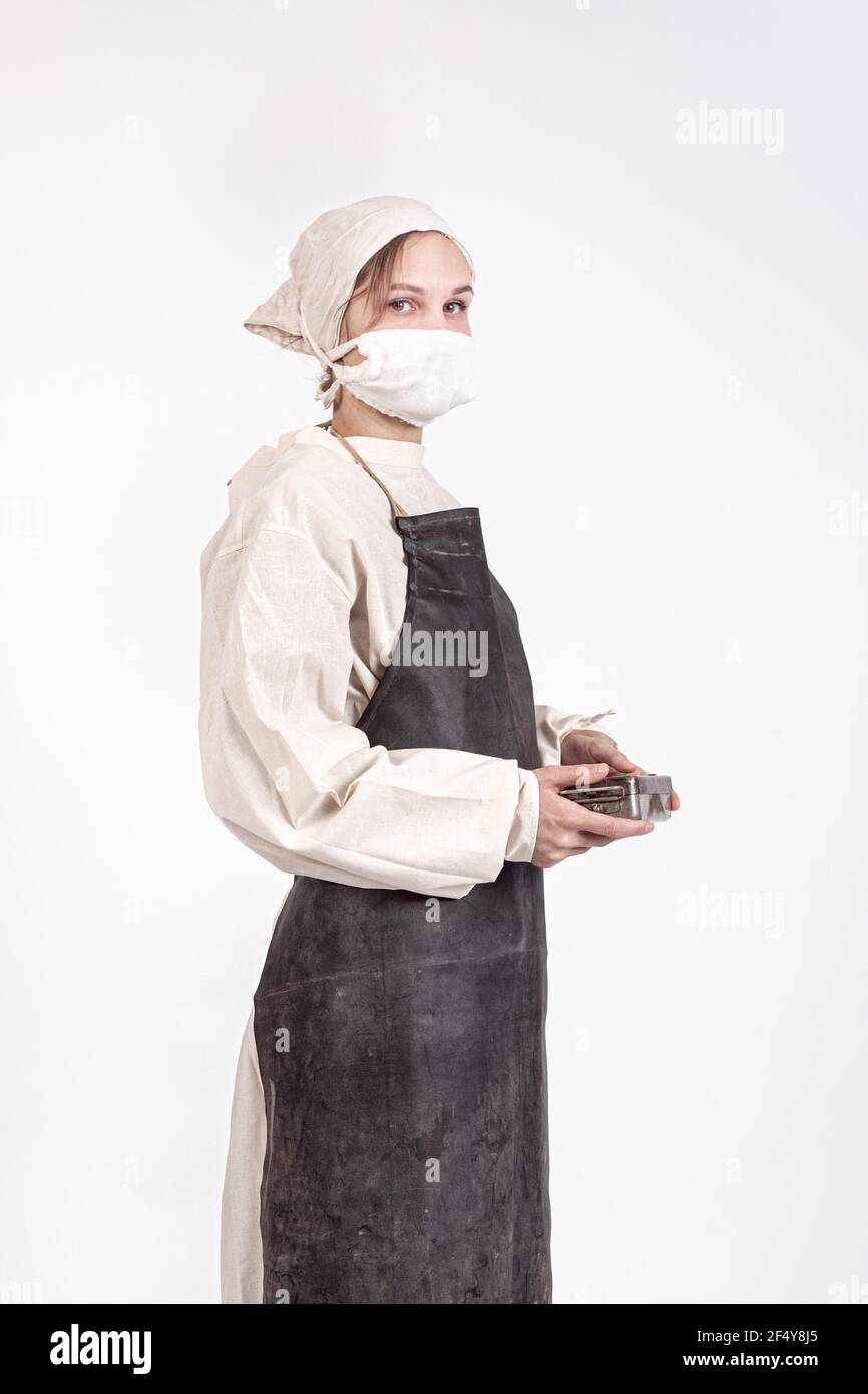 Young woman in white medical clothes, doctor or nurse of the Soviet ...