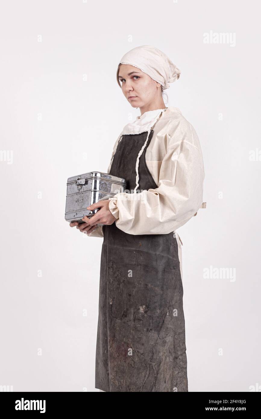 Young woman in white medical clothes, doctor or nurse of the Soviet ...