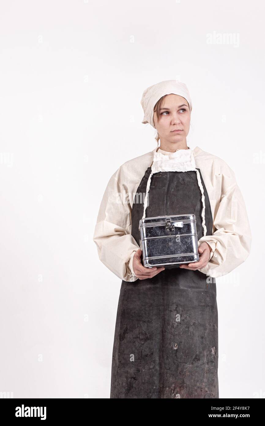Young woman in white medical clothes, doctor or nurse of the Soviet ...