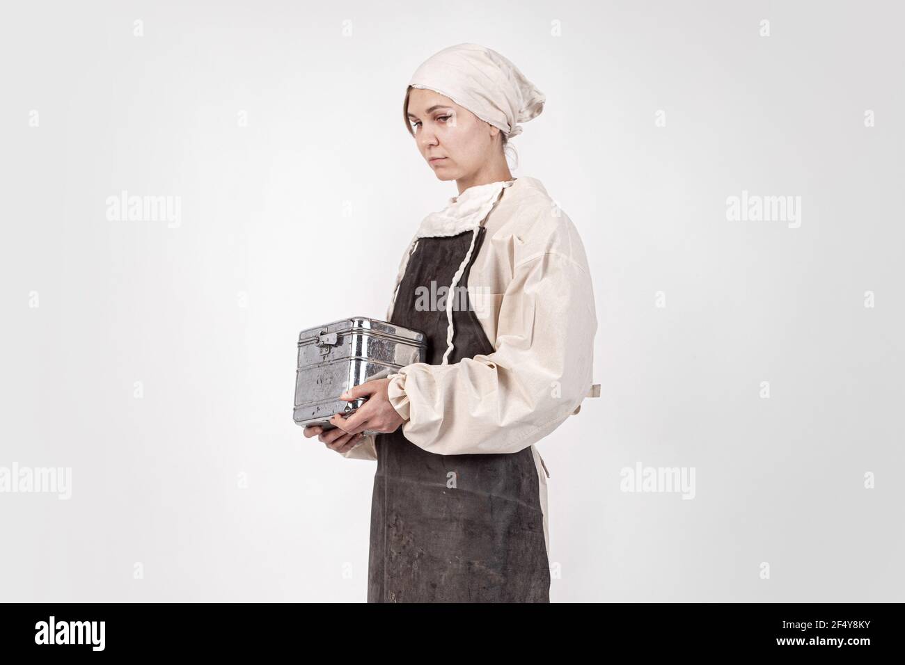 Young woman in white medical clothes, doctor or nurse of the Soviet ...