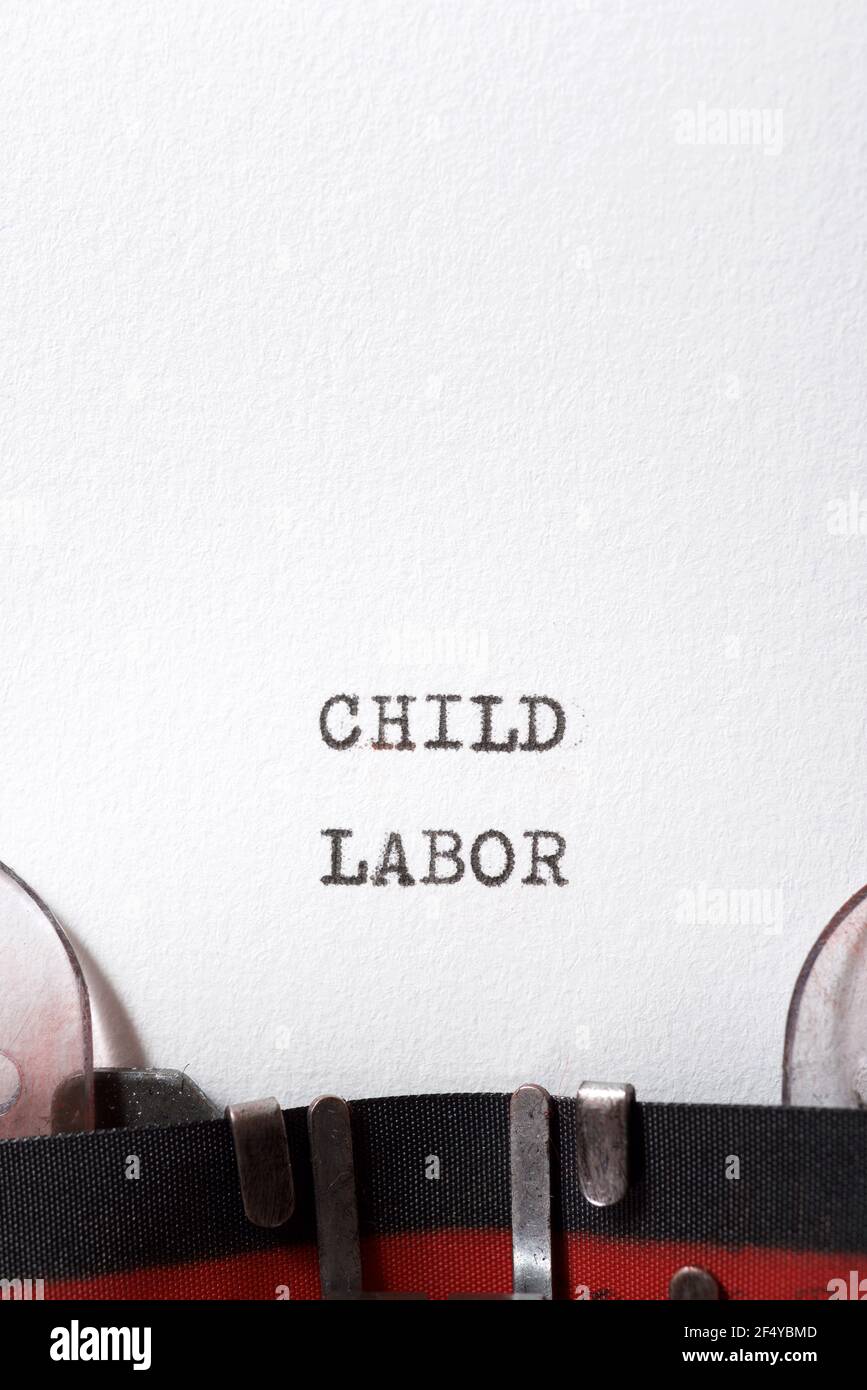 Child labor phrase written with a typewriter Stock Photo - Alamy